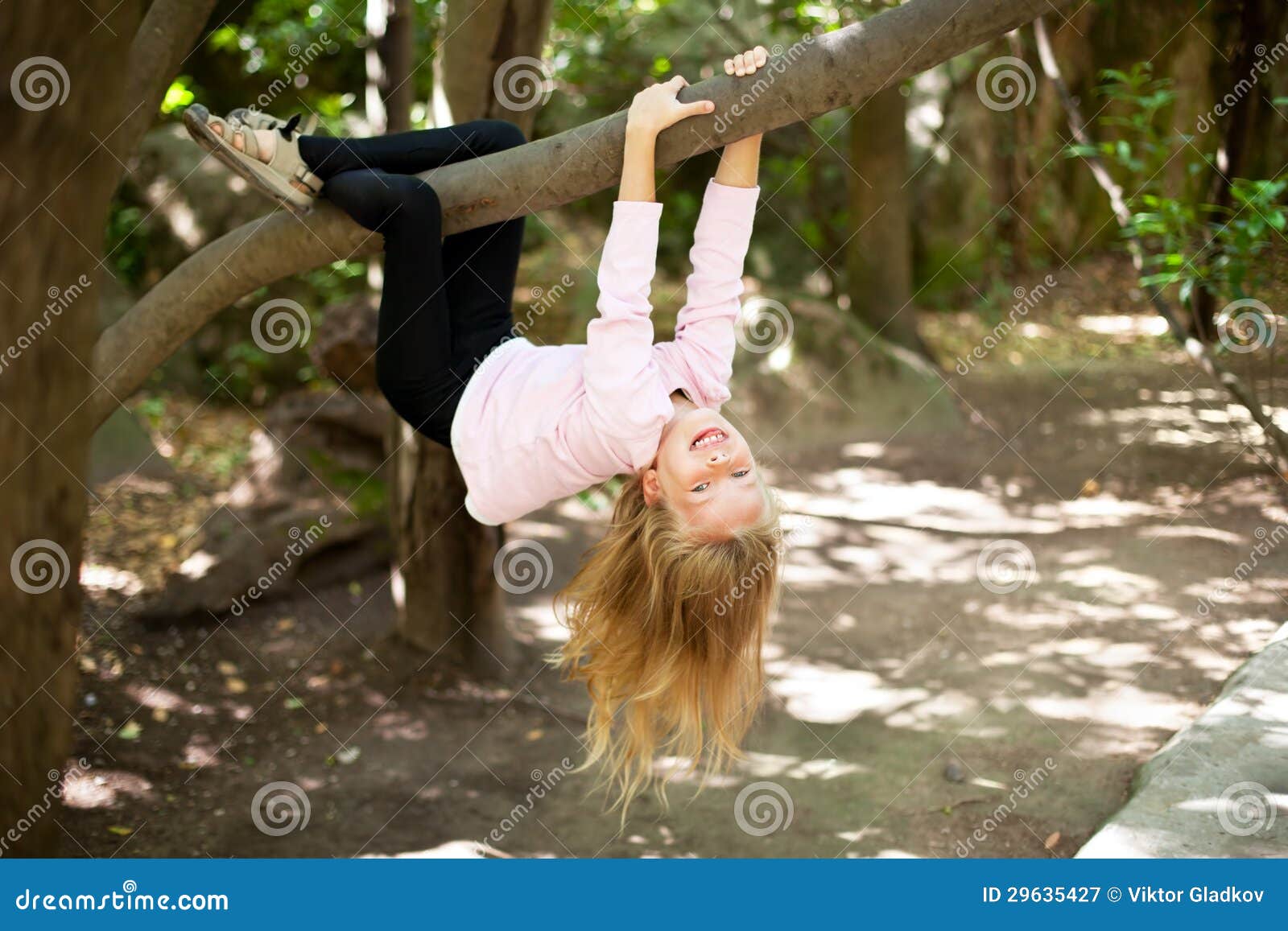 Girl hangs from a tree stock image. Image of female, moving - 29635427