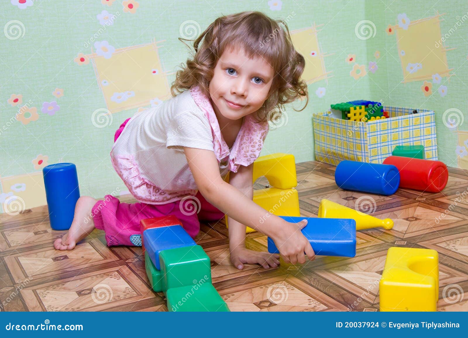 The Girl Has Built a Tower Out of Blocks Stock Photo - Image of baby ...