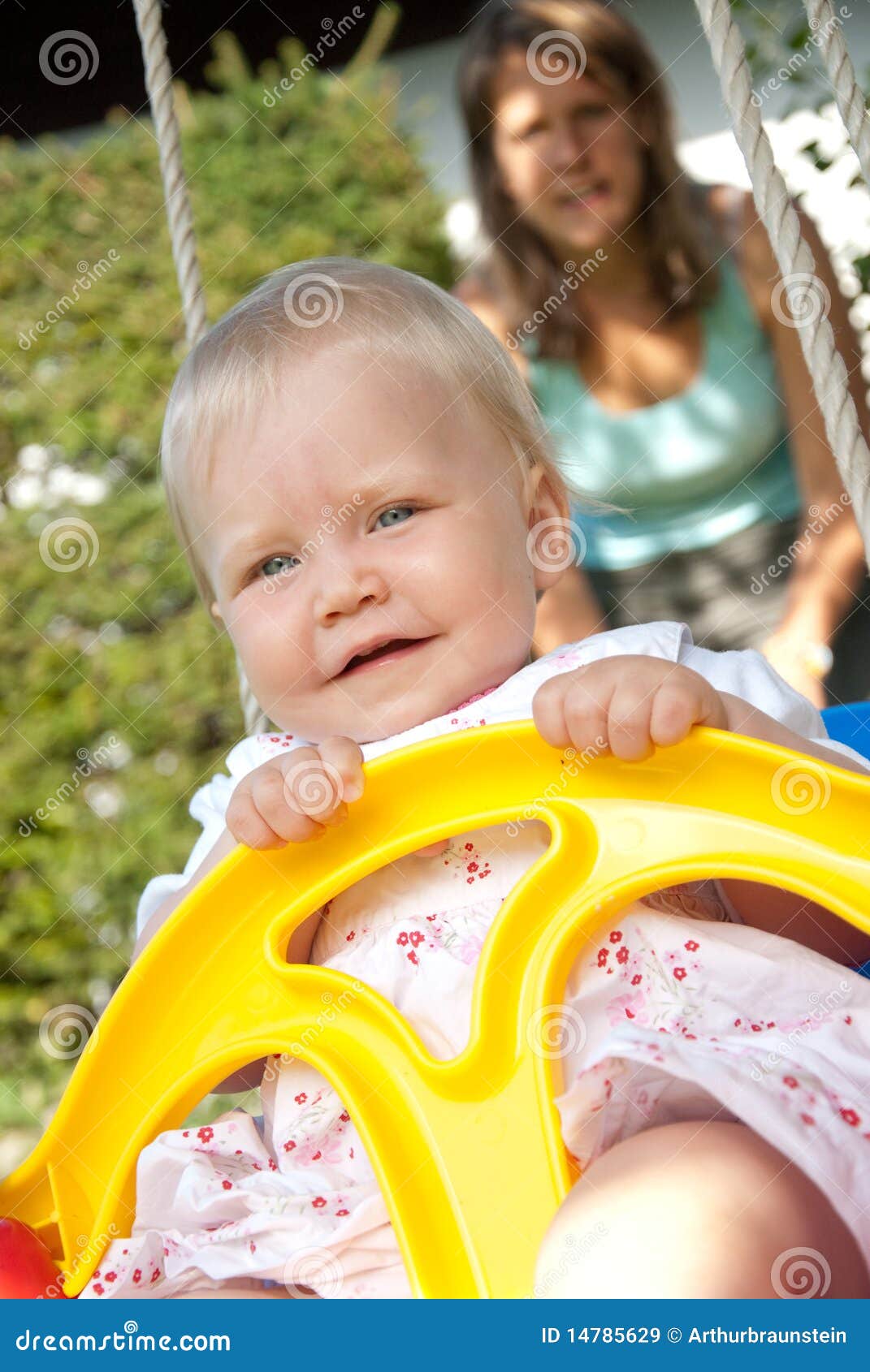 Girl has fun while rocking stock image. Image of girl - 14785629