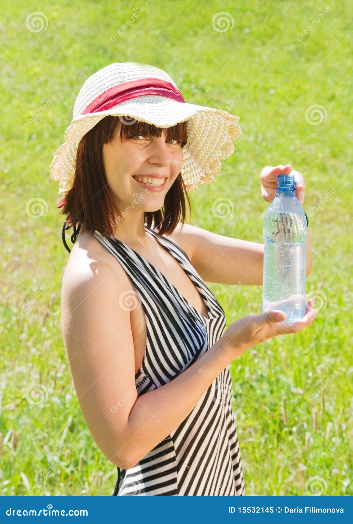 Girl in Hat with Bottle of Water Stock Image - Image of outdoors ...