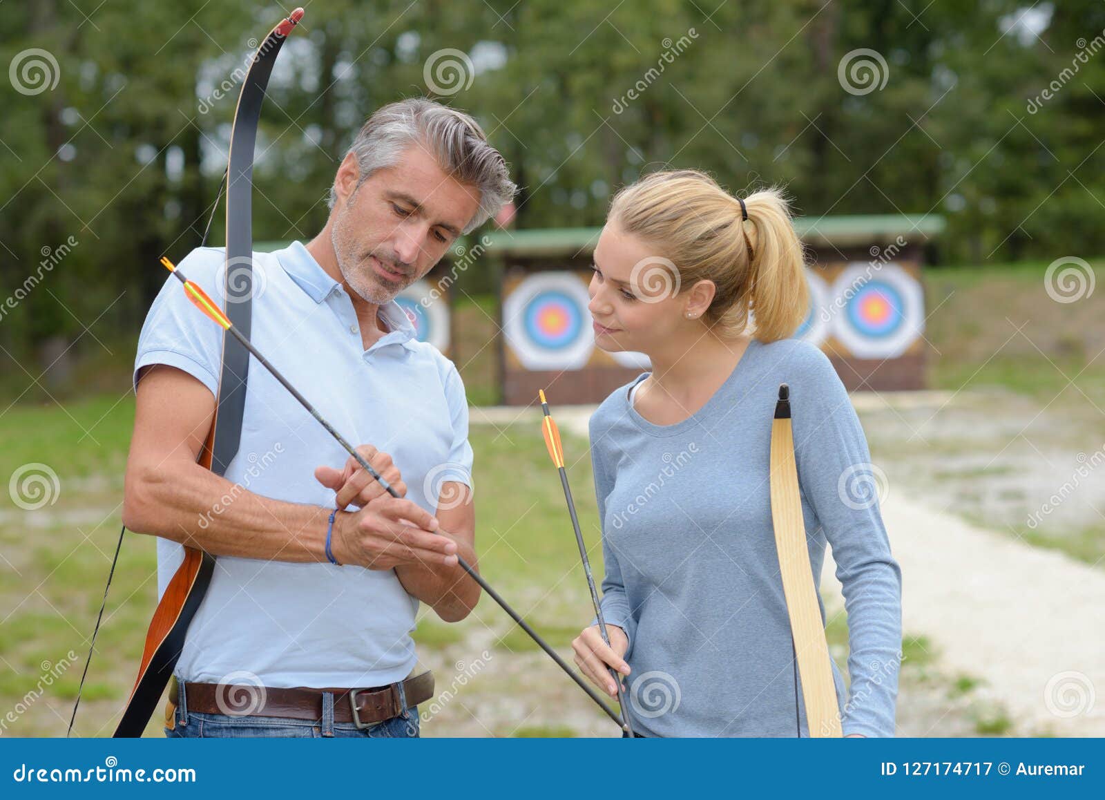 Girl Having Archery Lessons Stock Image - Image of shoot, sporty: 127174717