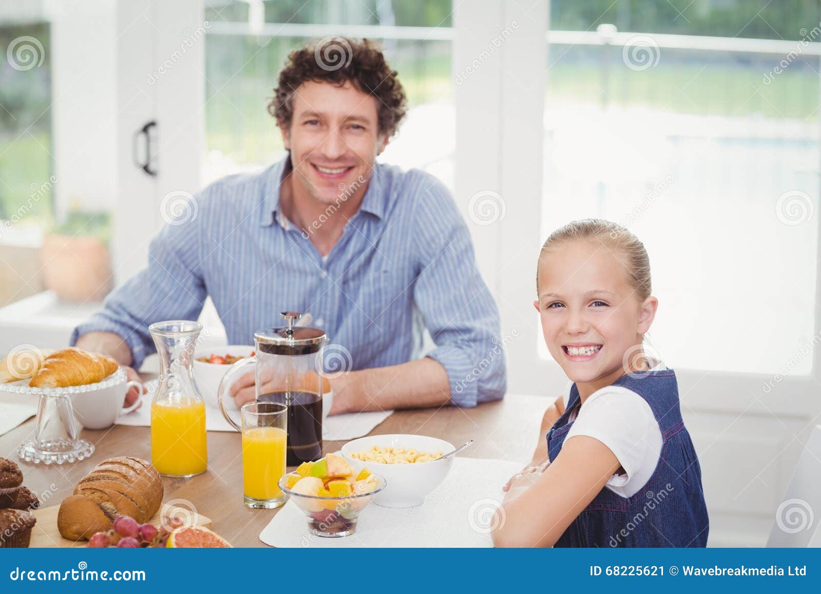 Girl Having Breakfast with Father Stock Image - Image of house, female ...