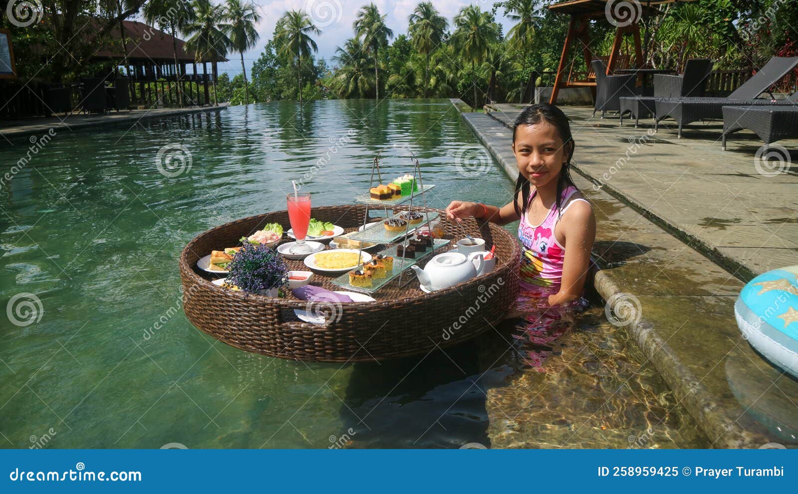 A Girl Having Breakfast Floating in the Pool Stock Image - Image of ...