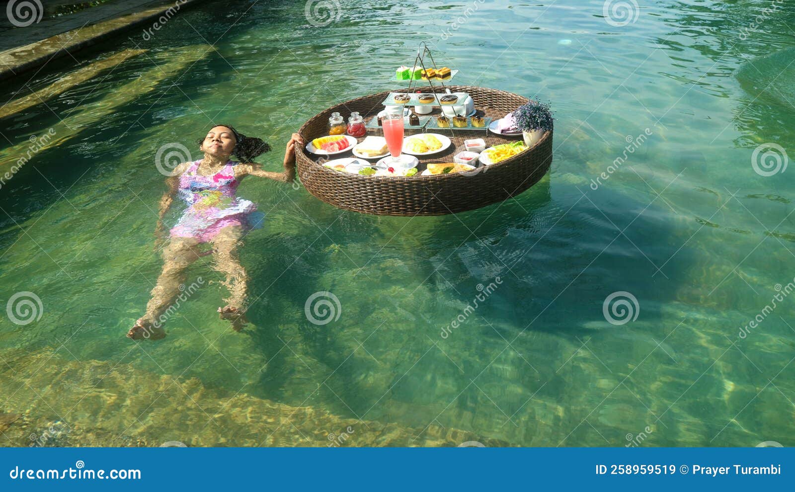 A Girl Having Breakfast Floating in the Pool Stock Image - Image of ...