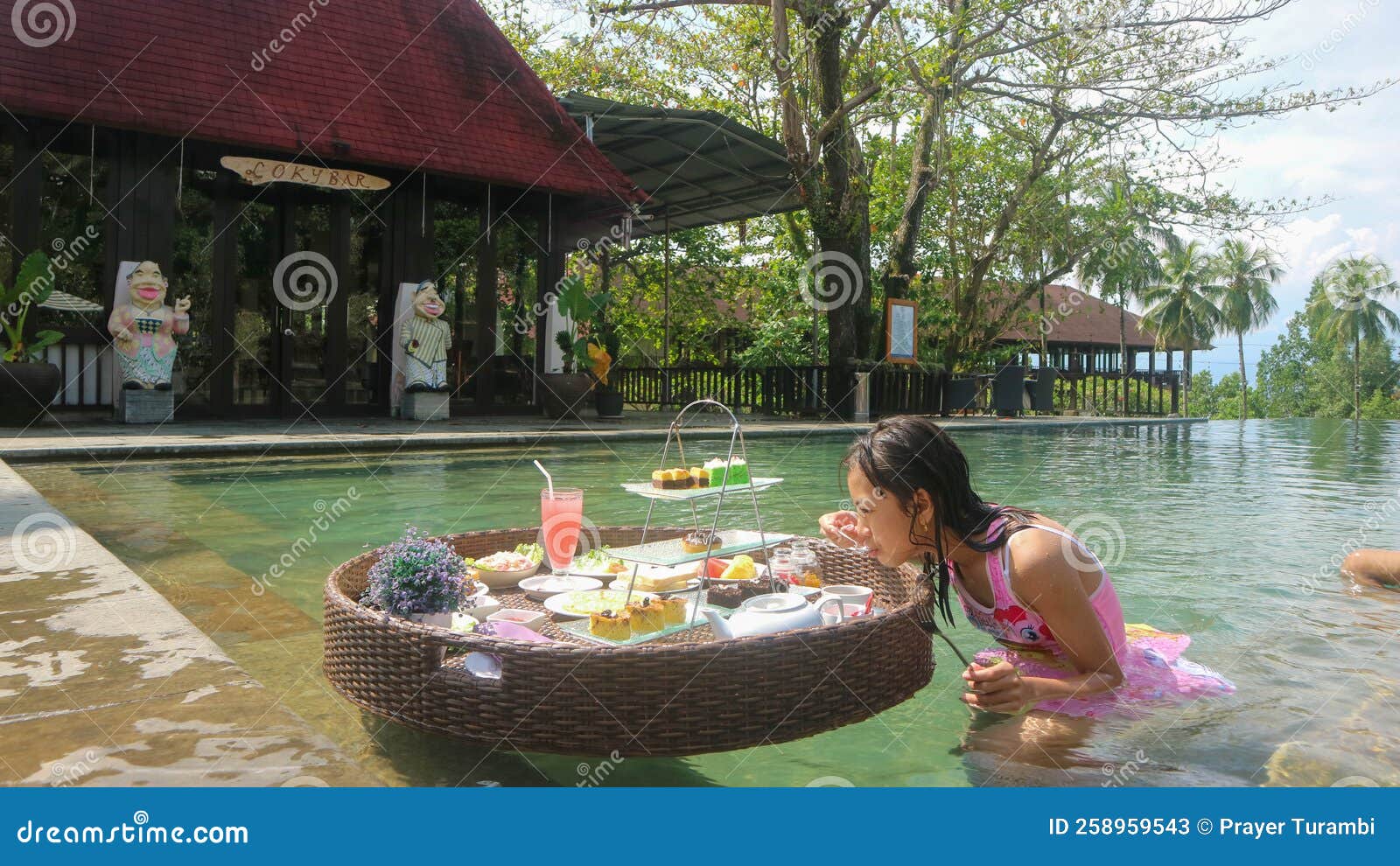A Girl Having Breakfast Floating in the Pool Stock Image - Image of ...