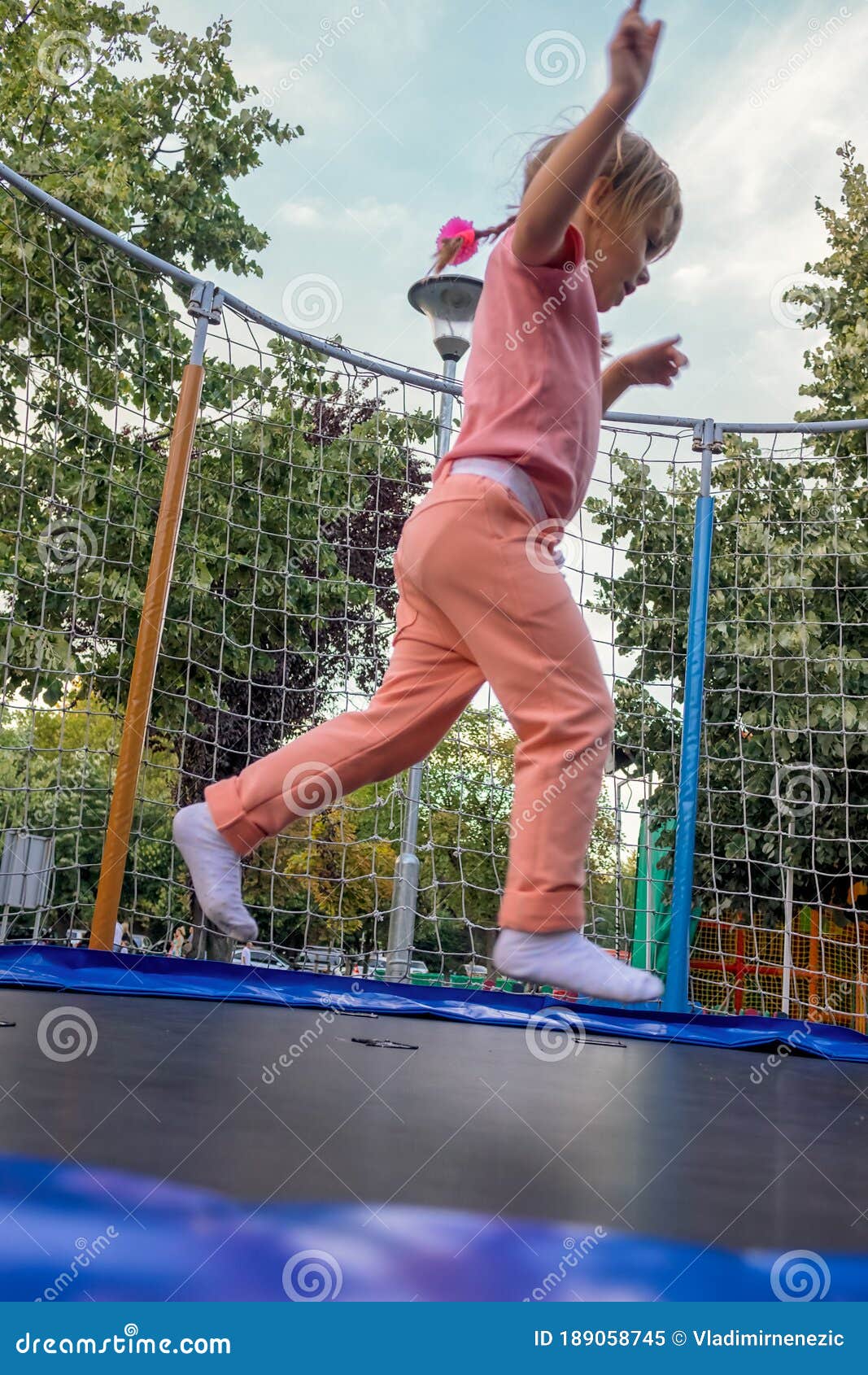 Fun on trampoline stock image. Image of play, cute, young - 189058745