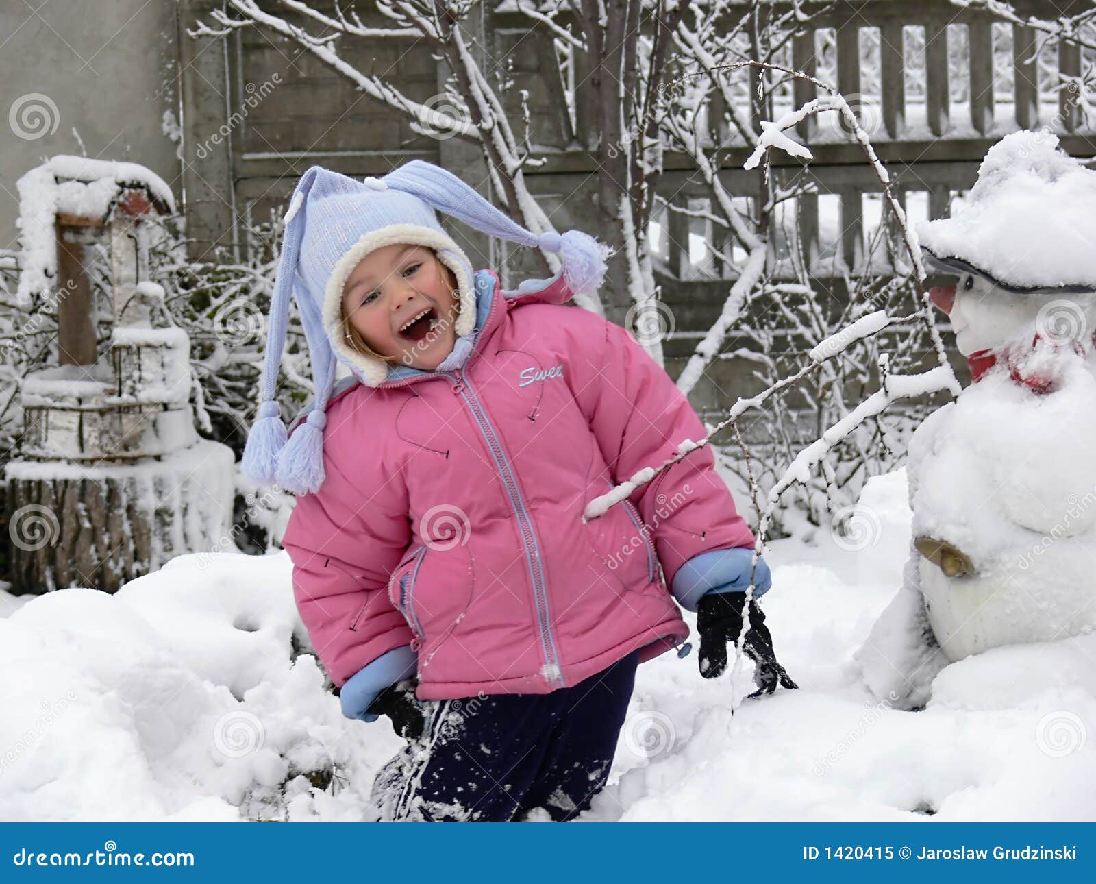A Girl Having Fun in the Snow Stock Image - Image of play, seasonal ...