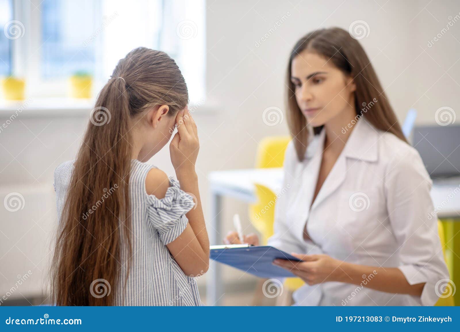 Girl Having a Headache and Talking To the Doctor Stock Image - Image of ...