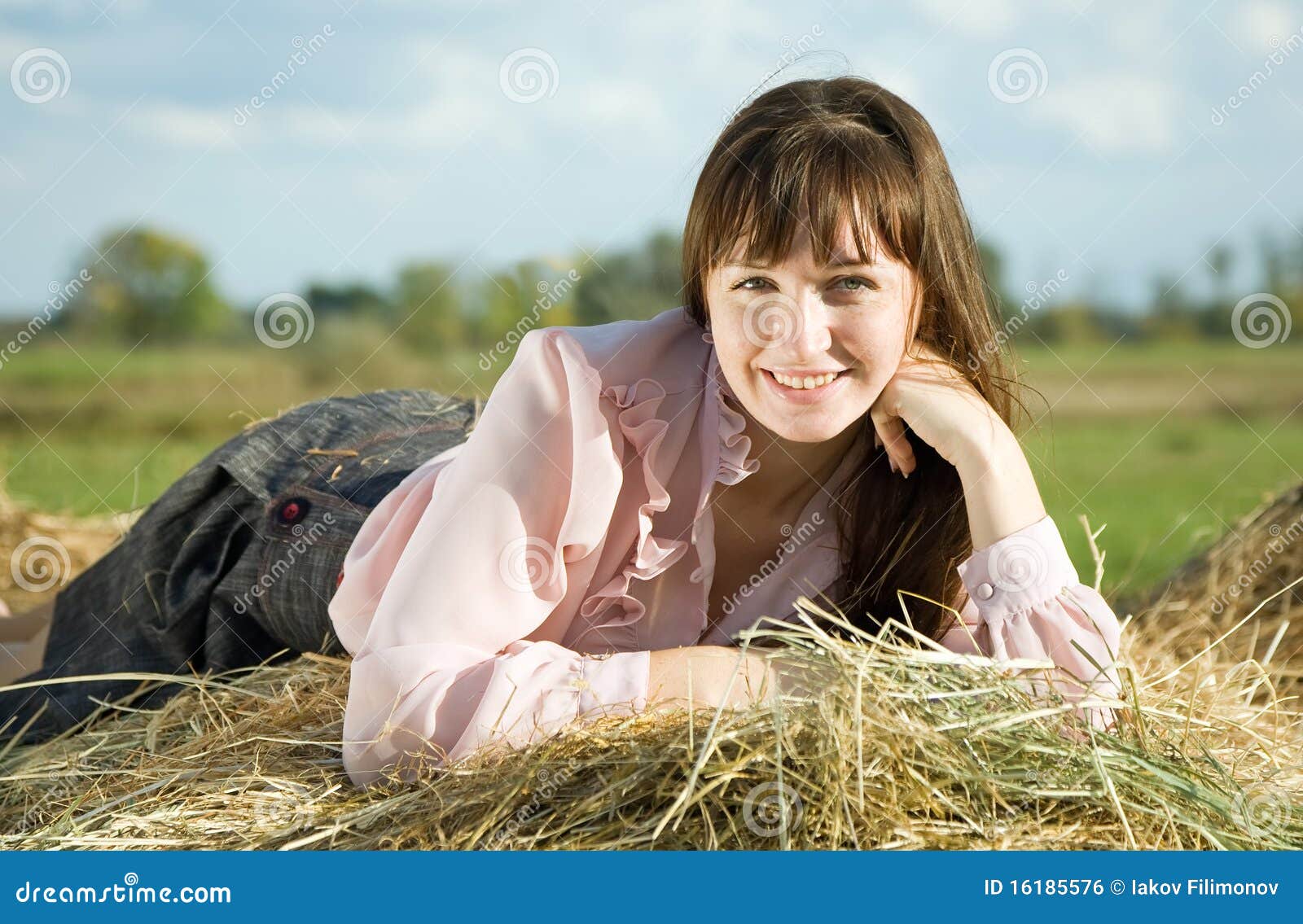 Girl on hay in summer stock photo. Image of haystack - 16185576