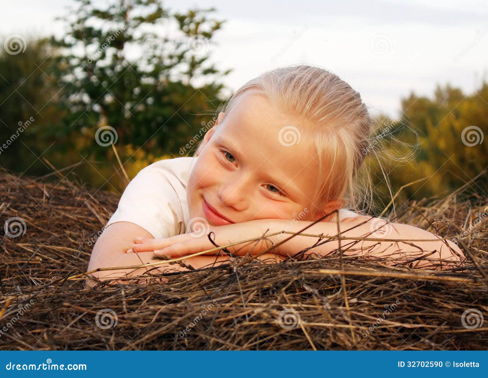 Girl on a haystack stock photo. Image of autumn, farm - 32702590