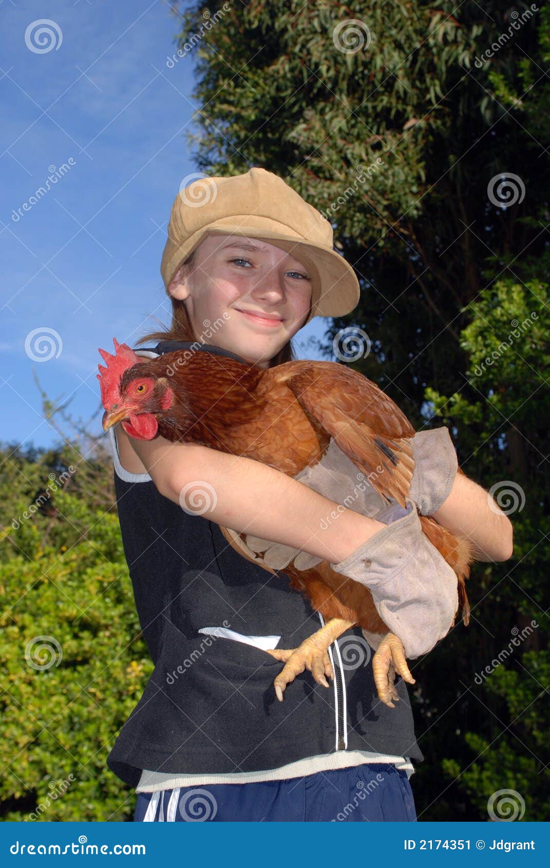 Girl with hen stock image. Image of good, girl, love, athletic - 2174351