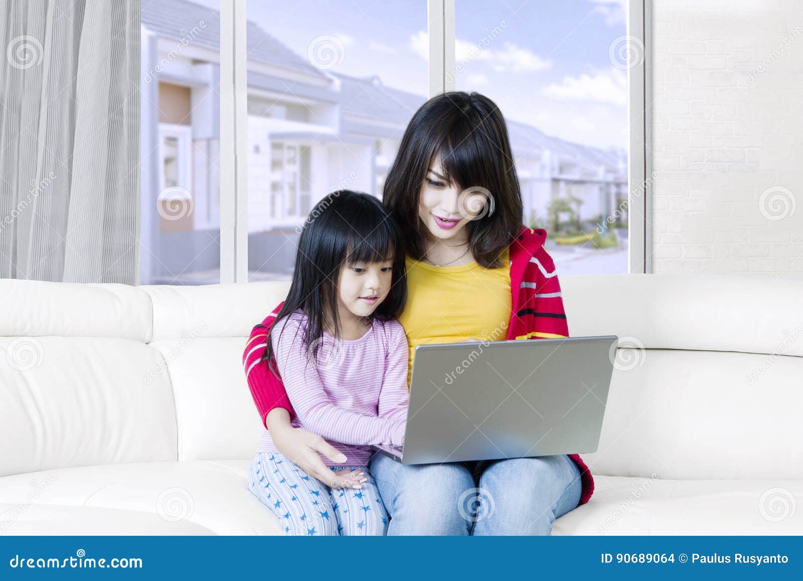 Girl and Her Mother Using Laptop at Home Stock Photo - Image of little ...