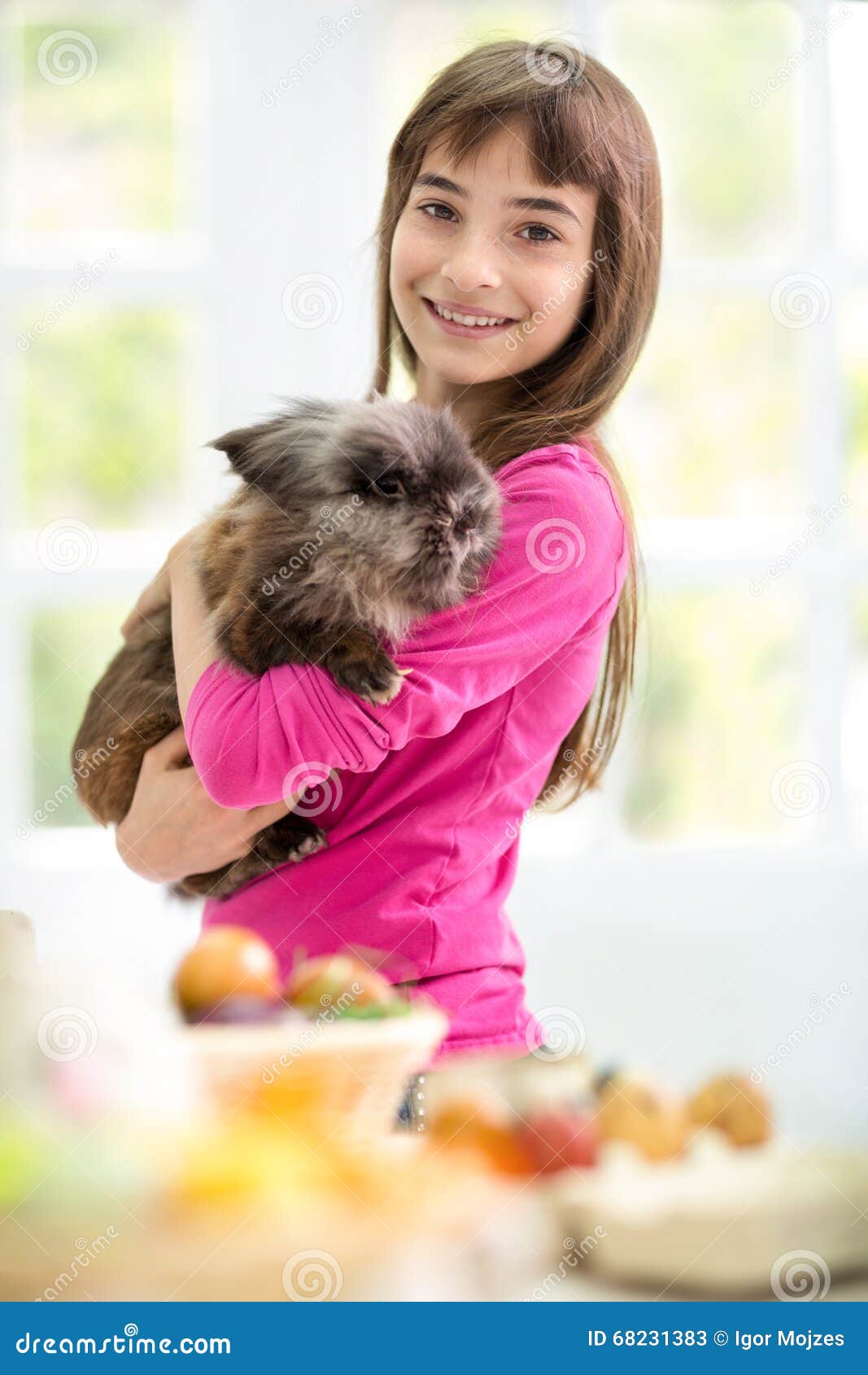 Girl with her pet rabbit stock image. Image of celebration - 68231383