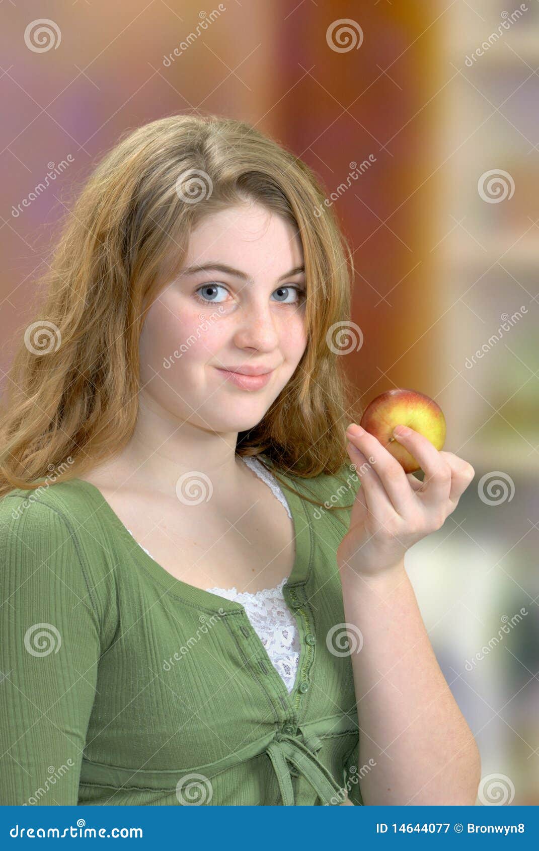 Girl Holding Apple stock image. Image of nutrition, youth - 14644077
