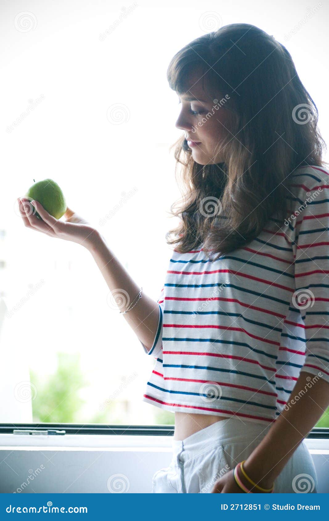 Girl holding apple stock image. Image of woman, offer - 2712851