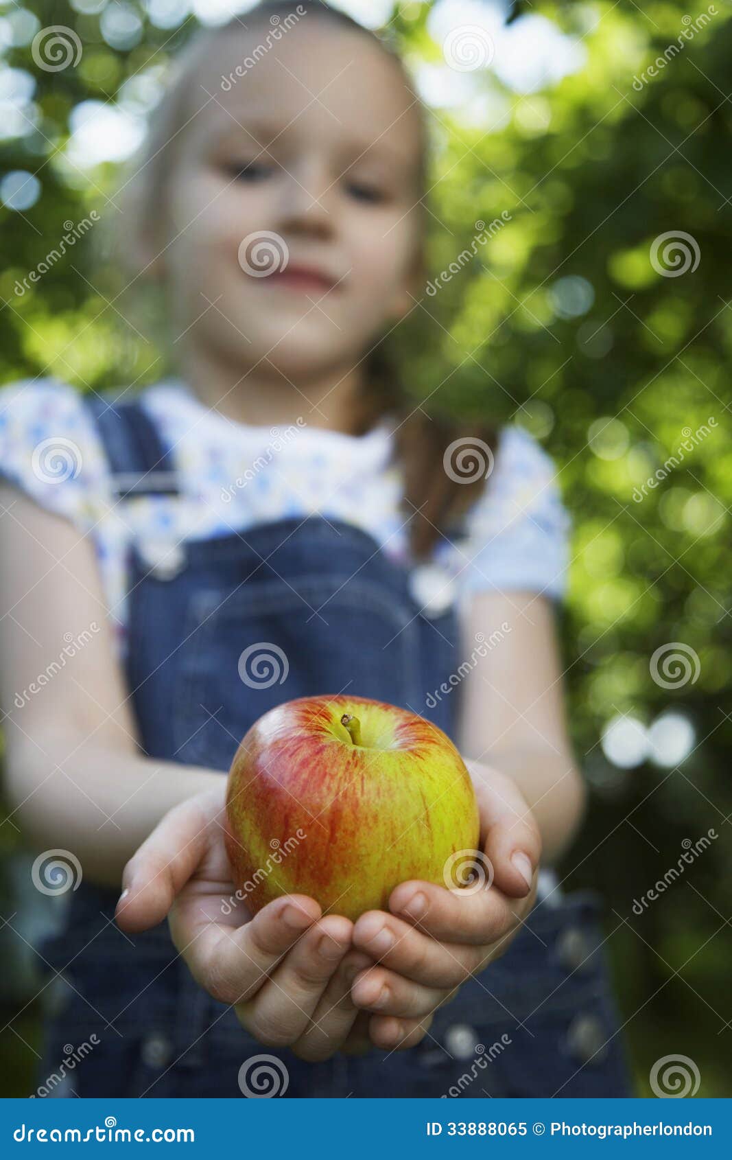 Girl Holding Apple stock image. Image of discovery, nutrition - 33888065