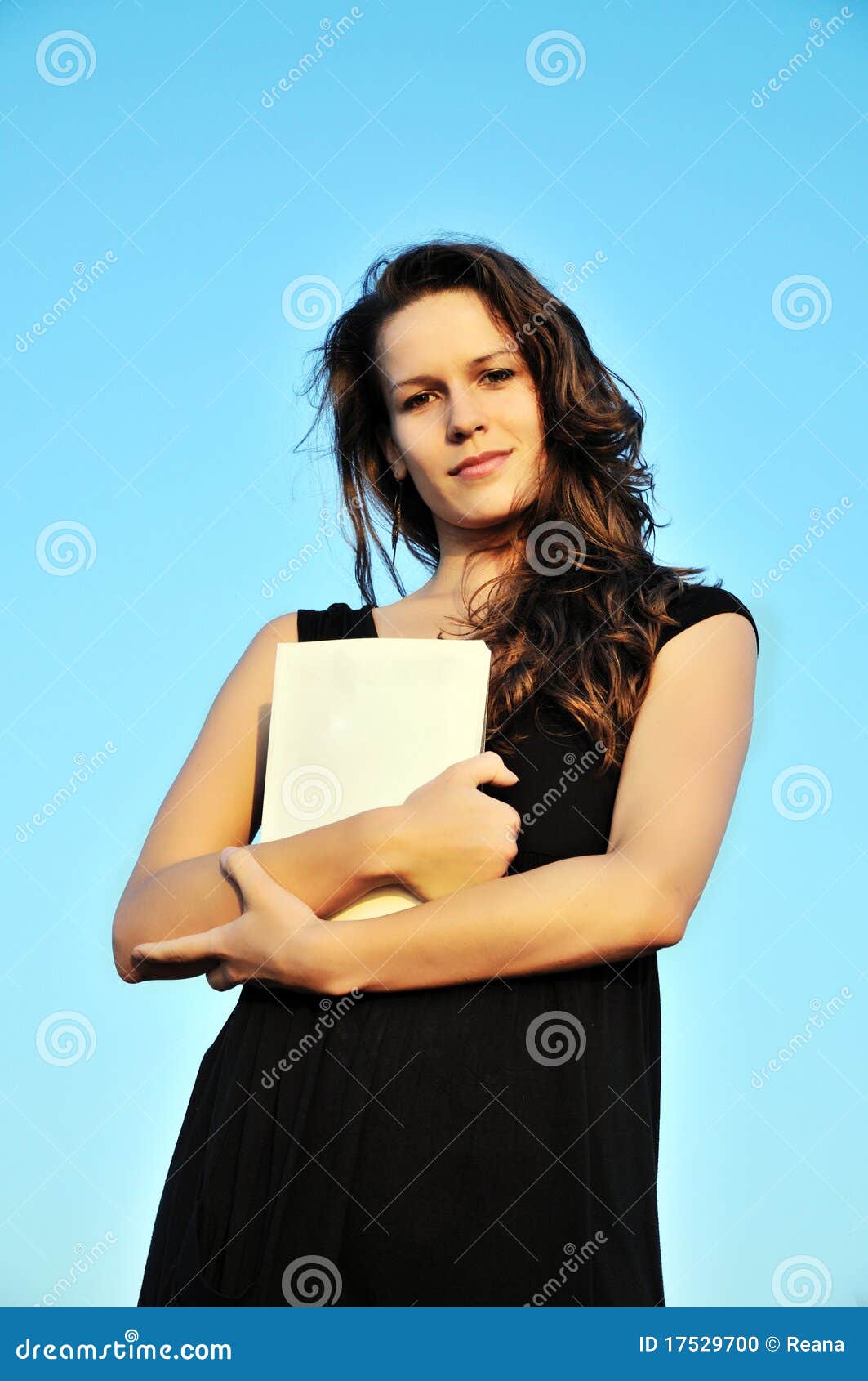 Girl holding book stock photo. Image of student, expressing - 17529700