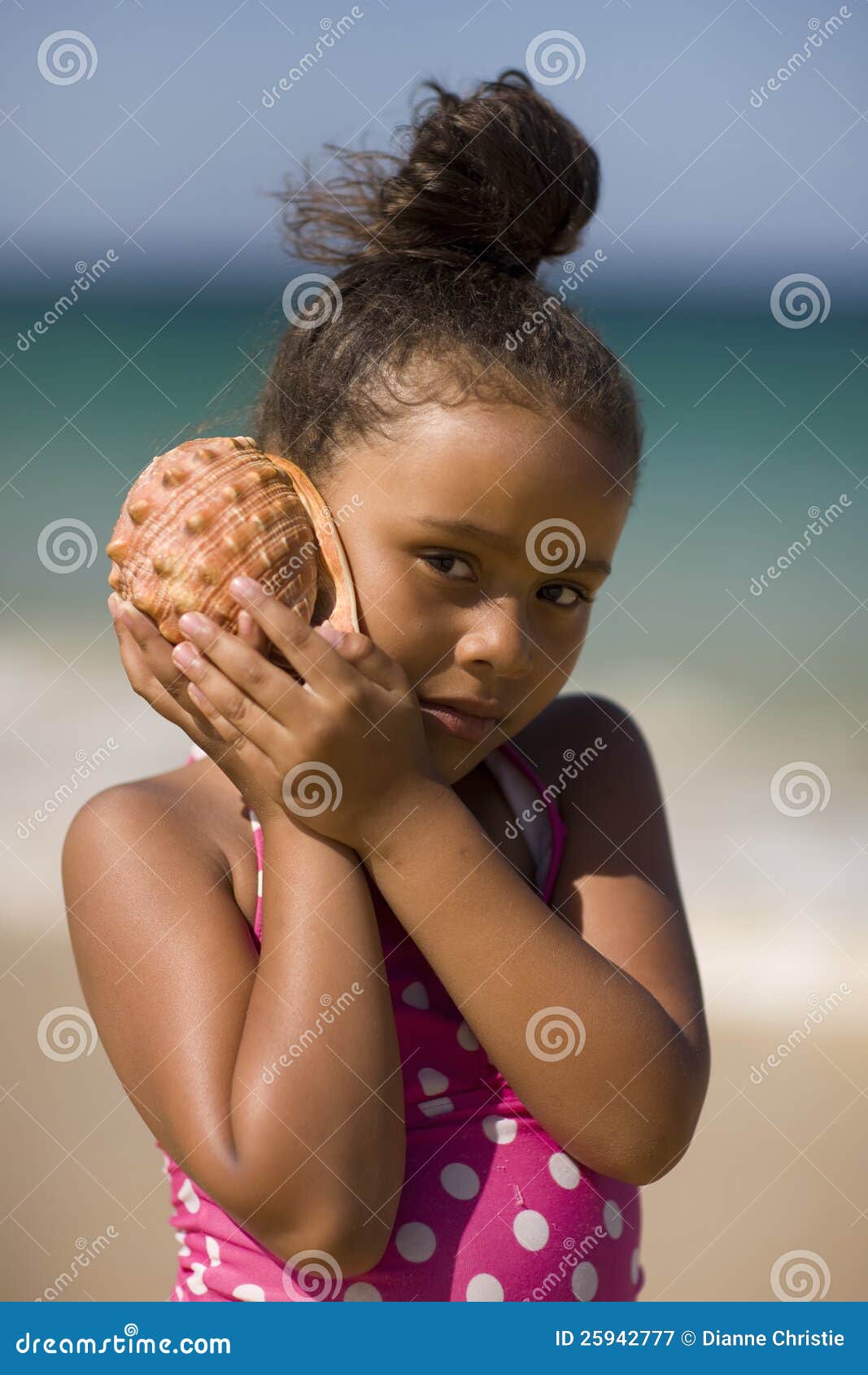 Girl Holding Conch Shell Next To Her Ear. Stock Image - Image of colour ...