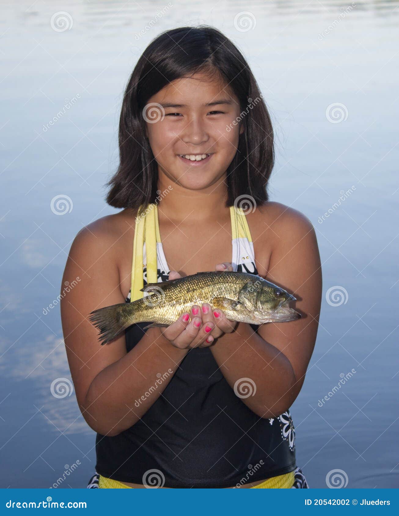 Girl Holding a Fish stock photo. Image of fish, beautiful - 20542002