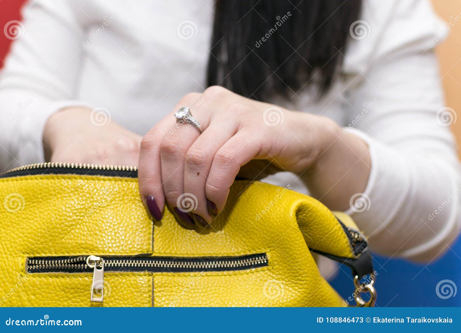 Girl Holding Her Bag. Search for Items in the Bag. Stock Image - Image ...