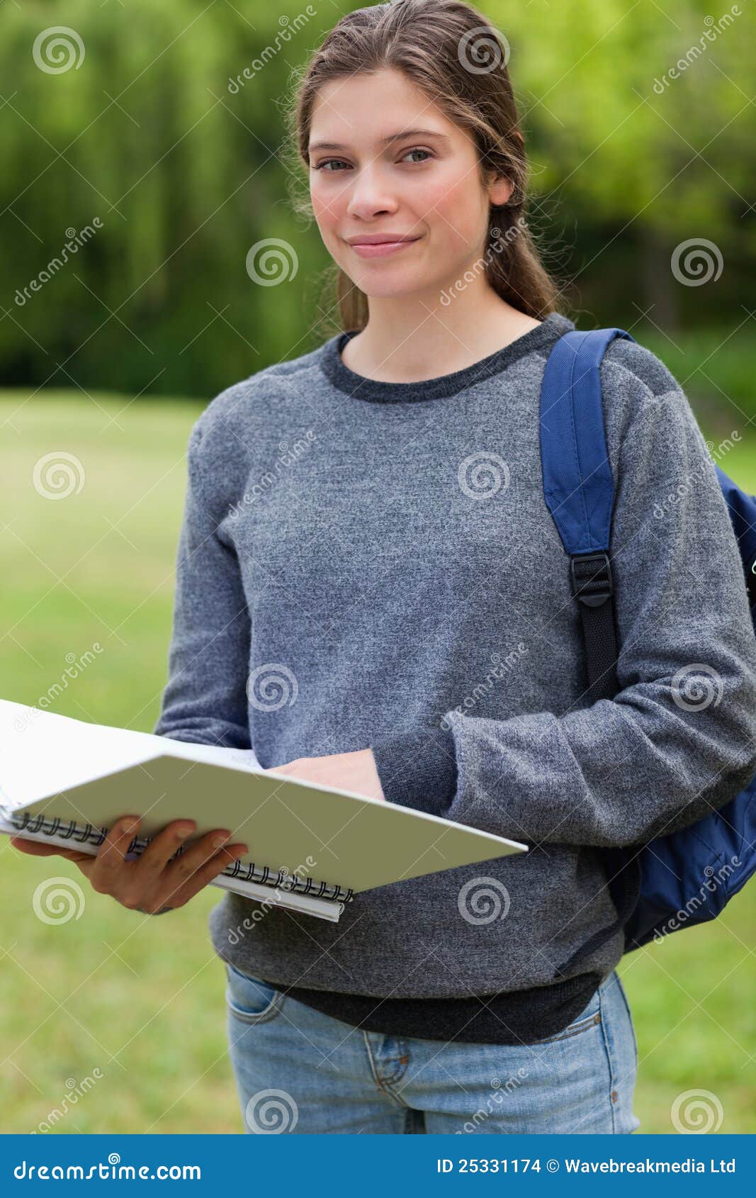 Girl Holding Her Notebook while Carrying Her Backp Stock Photo - Image ...