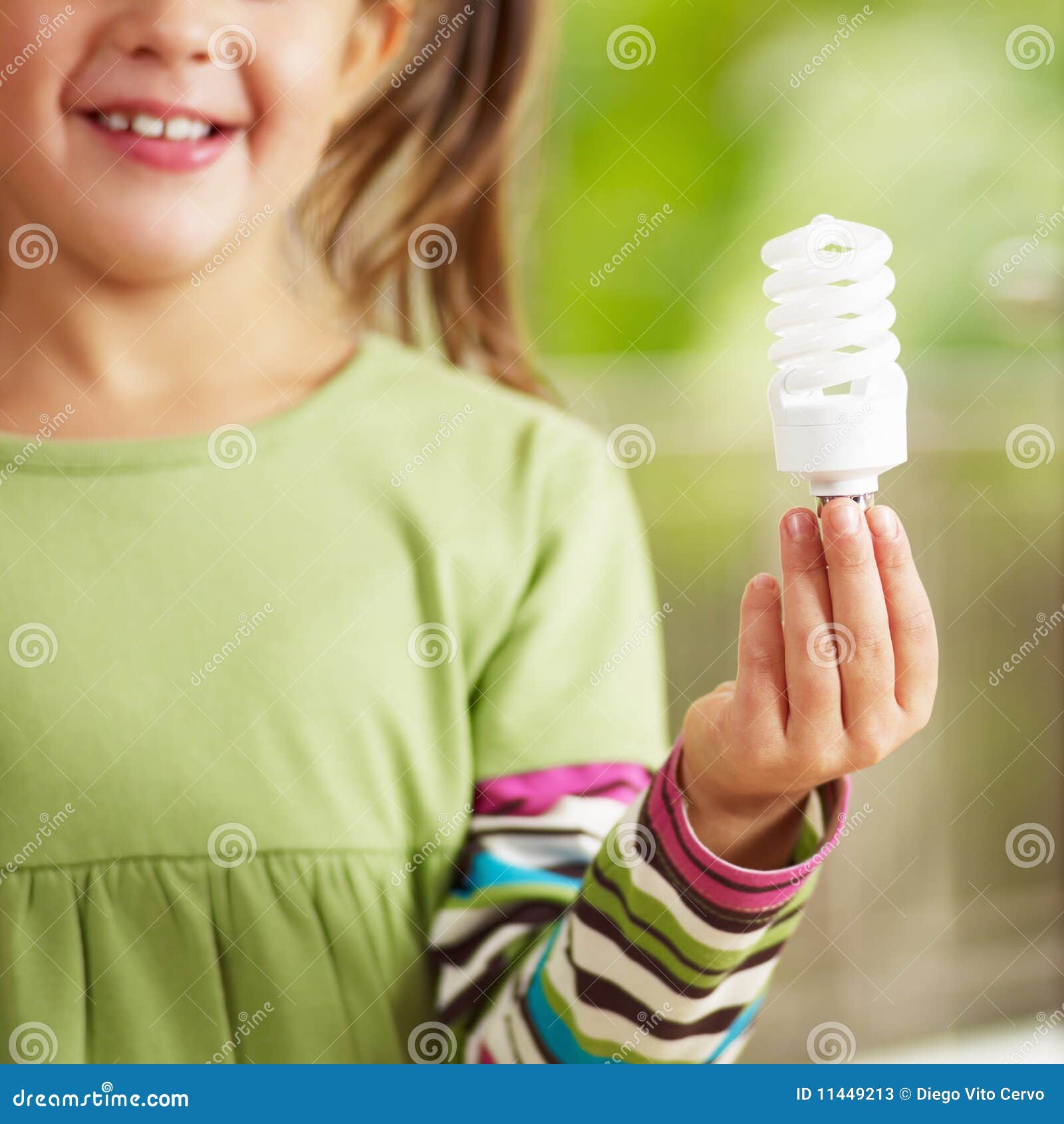 Girl holding light bulb stock image. Image of energy - 11449213 Girl holding light bulb stock image. Image of energy - 11449213