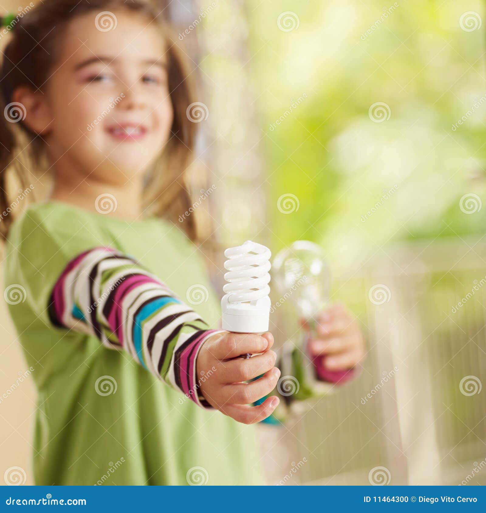 Girl holding light bulb stock photo. Image of indoors - 11464300 Girl holding light bulb stock photo. Image of indoors - 11464300