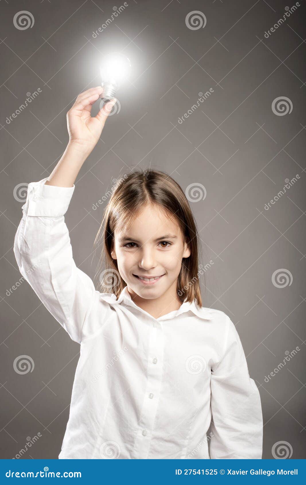 Girl holding a light bulb stock image. Image of bright - 27541525