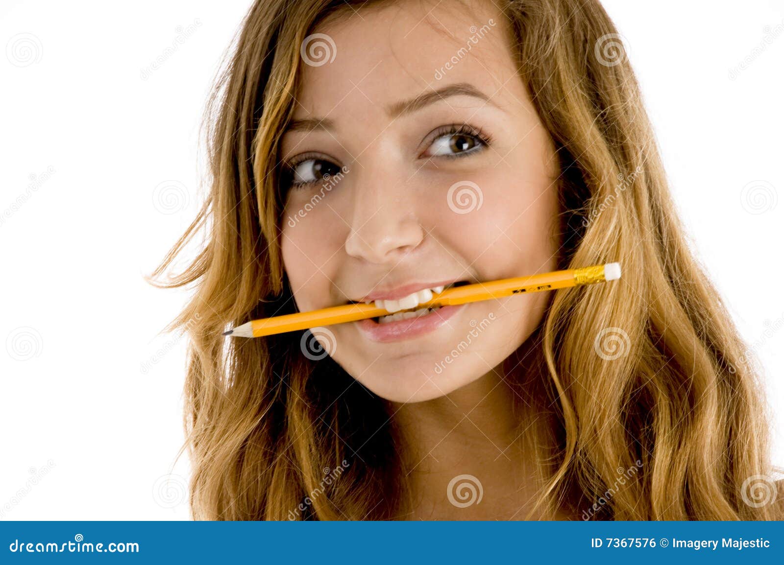 Girl Holding Pencil in Mouth Stock Photo - Image of holding, ethnicity ...