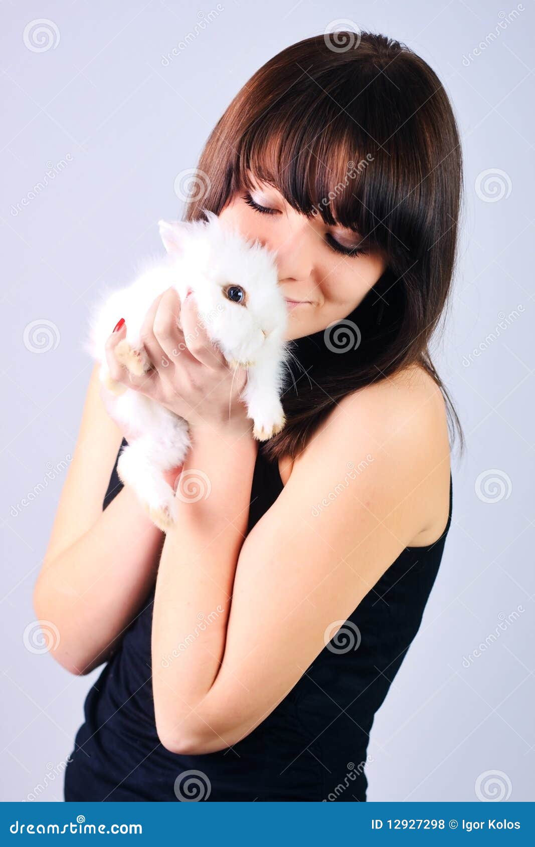 Girl holding a rabbit stock photo. Image of lifestyles - 12927298