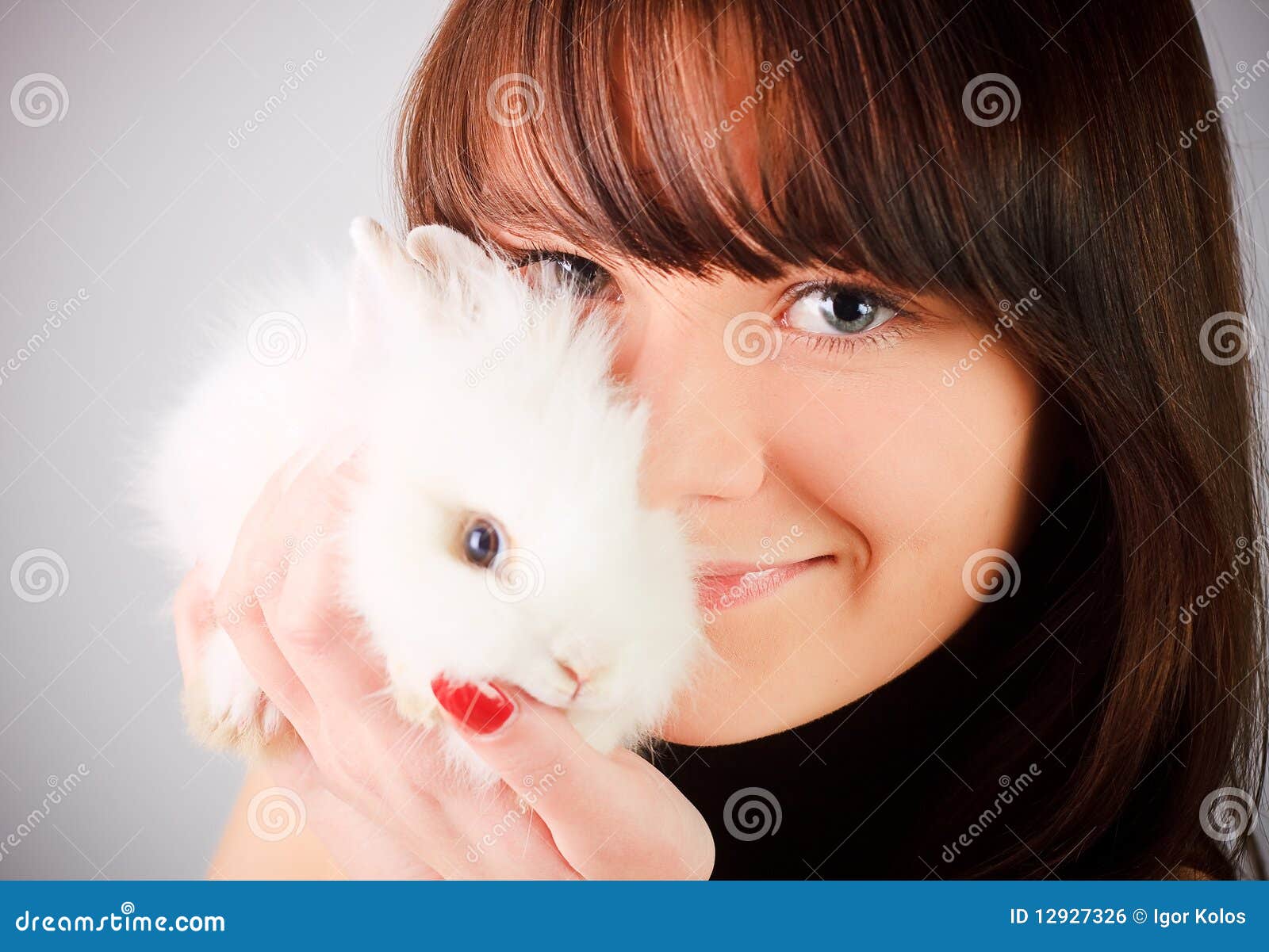 Girl Holding A Rabbit Royalty Free Stock Image - Image: 12927326