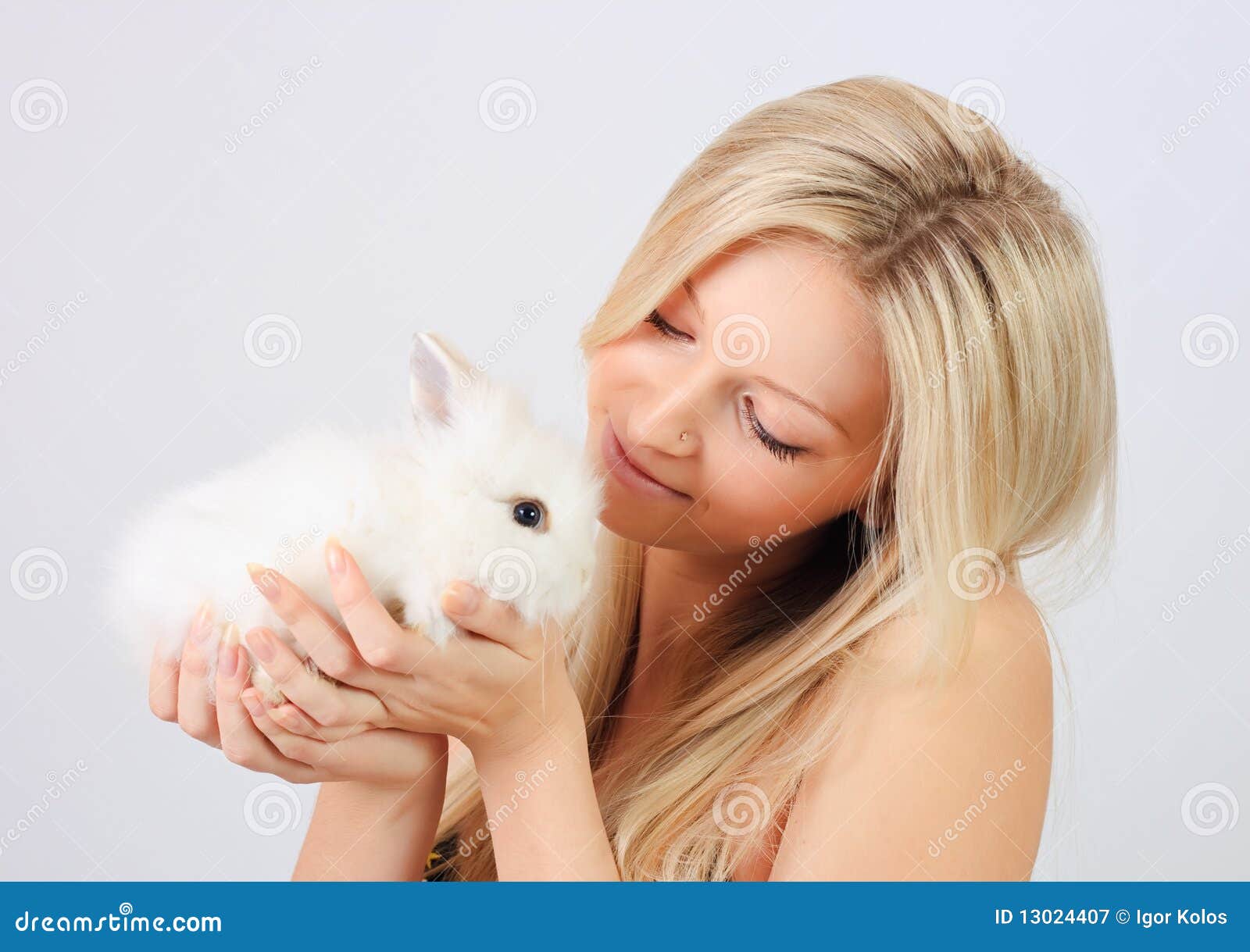 Girl holding a rabbit stock image. Image of cute, hair - 13024407