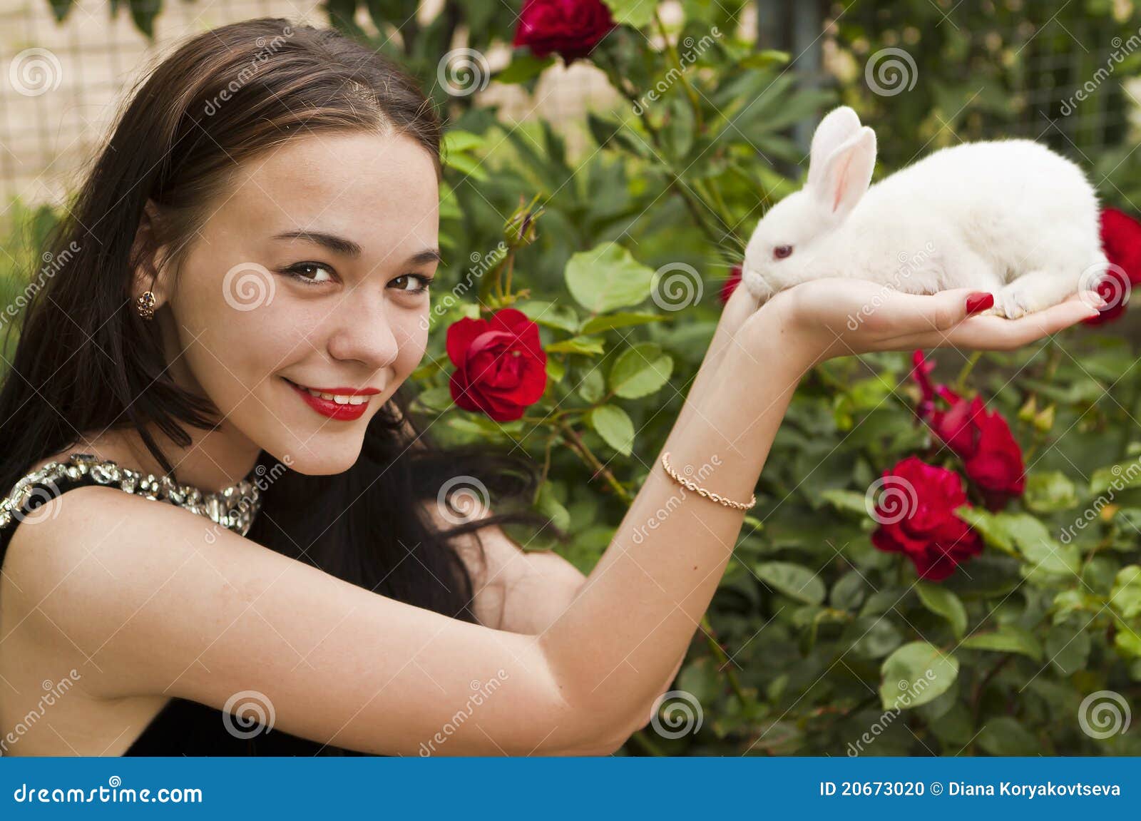 Girl holding rabbit stock photo. Image of portrait, rural - 20673020