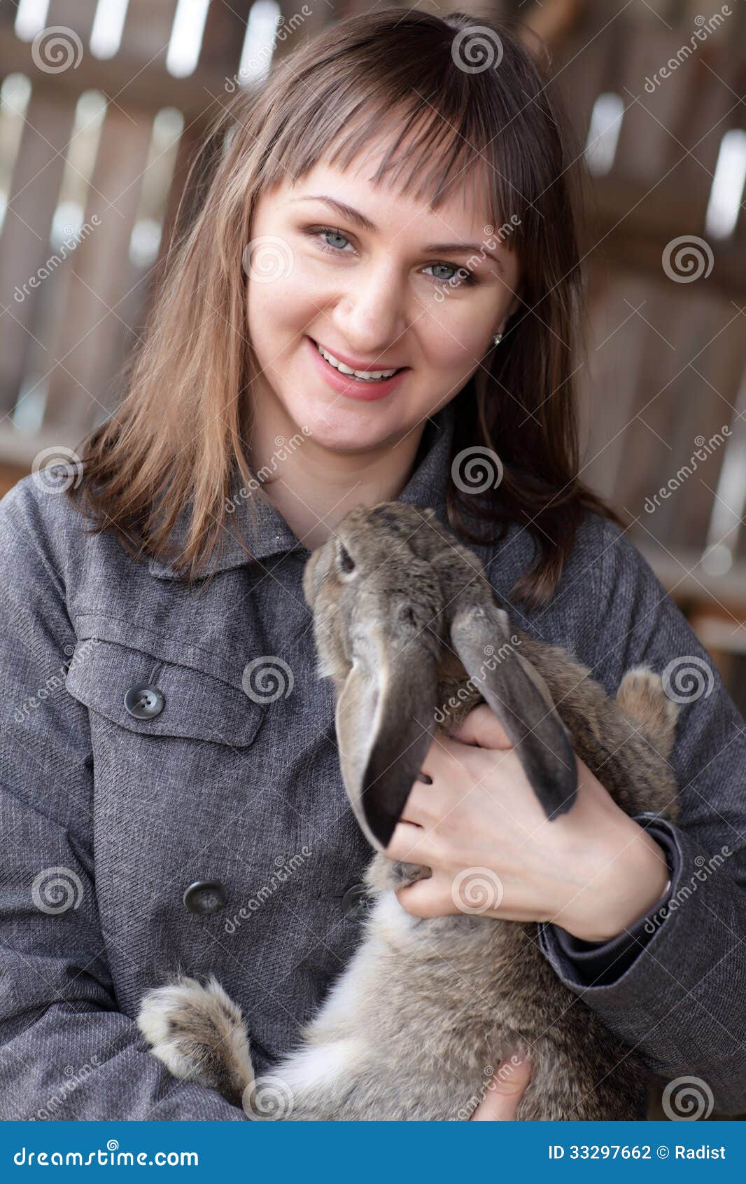 Girl holding rabbit stock photo. Image of cheerful, elegance - 33297662