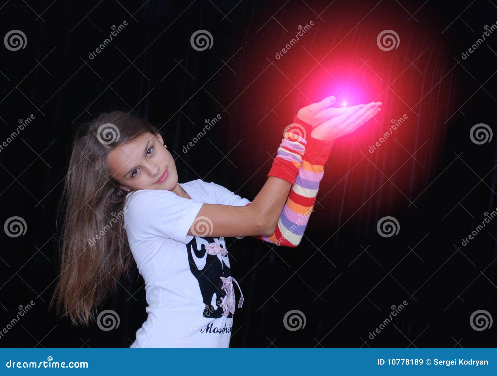 Girl holding red orb stock image. Image of ball, colored - 10778189