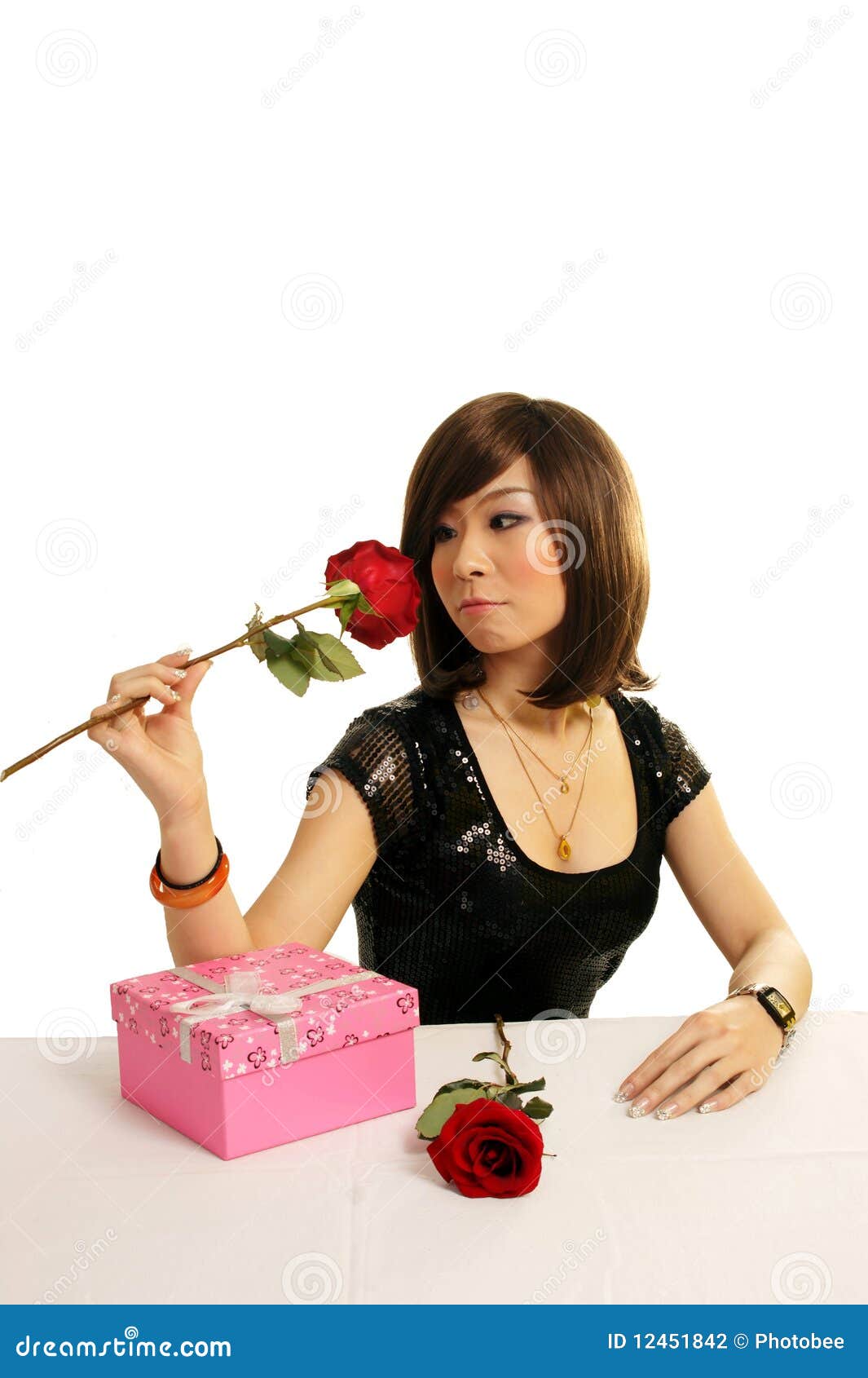 Girl holding a rose stock photo. Image of looking, pretty - 12451842