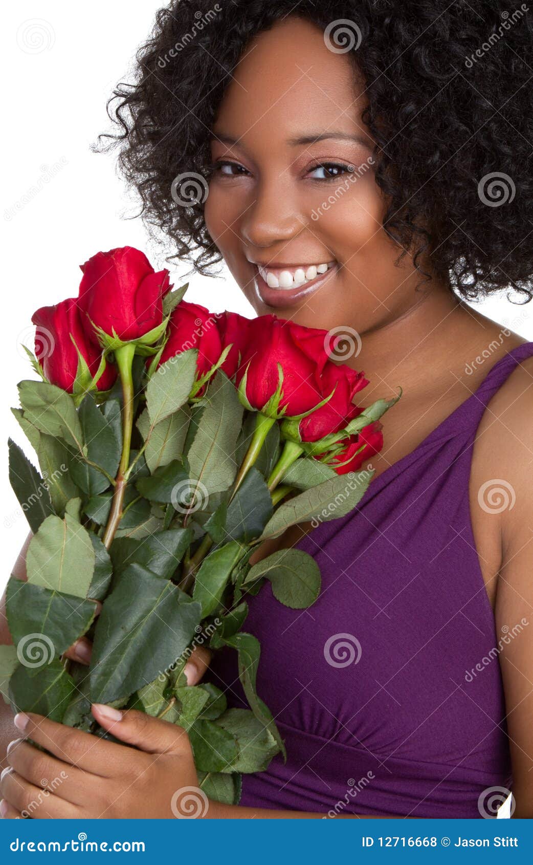 Girl Holding Roses stock photo. Image of afro, dozen - 12716668