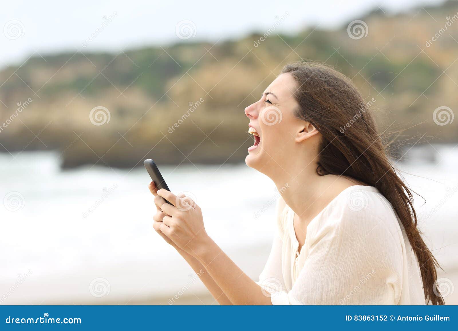 Girl Holding a Smart Phone Crying Desperately Stock Photo - Image of ... Girl Holding a Smart Phone Crying Desperately Stock Photo - Image of ...