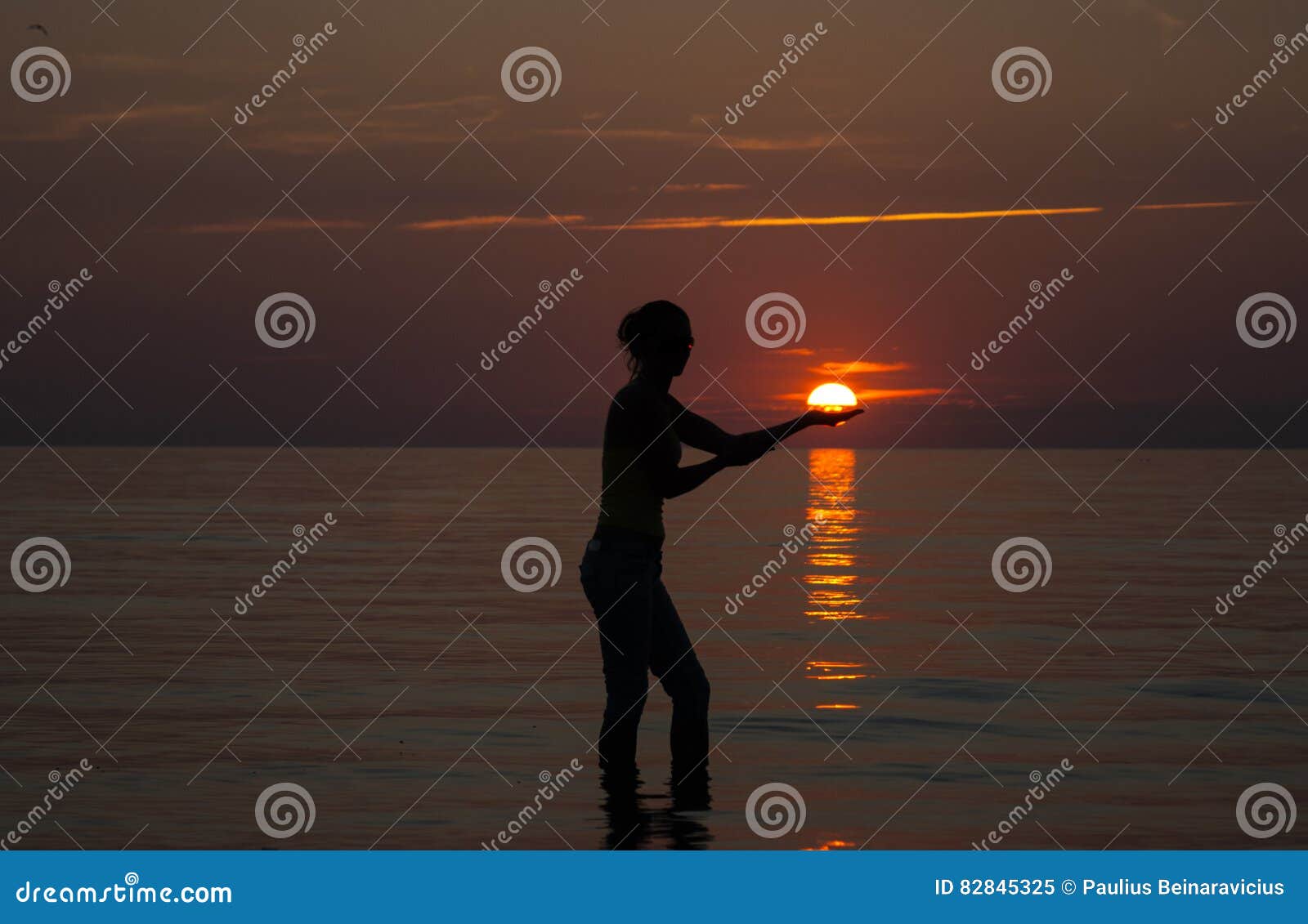 Girl holding sun stock image. Image of sunrise, activity - 82845325