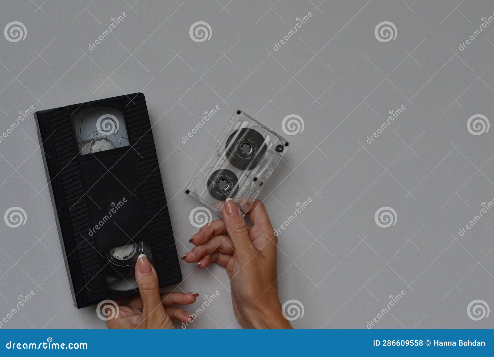 The Girl Holds Old Cassettes in Her Hands Stock Photo - Image of ...