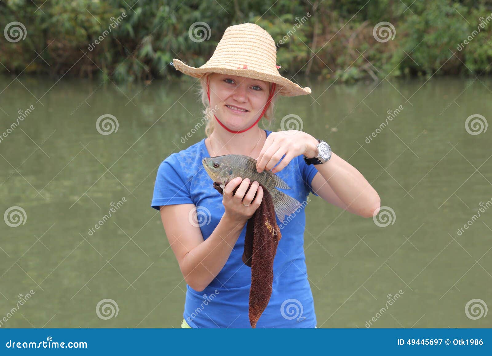 Girl hooked fish stock image. Image of lake, entertainment - 49445697