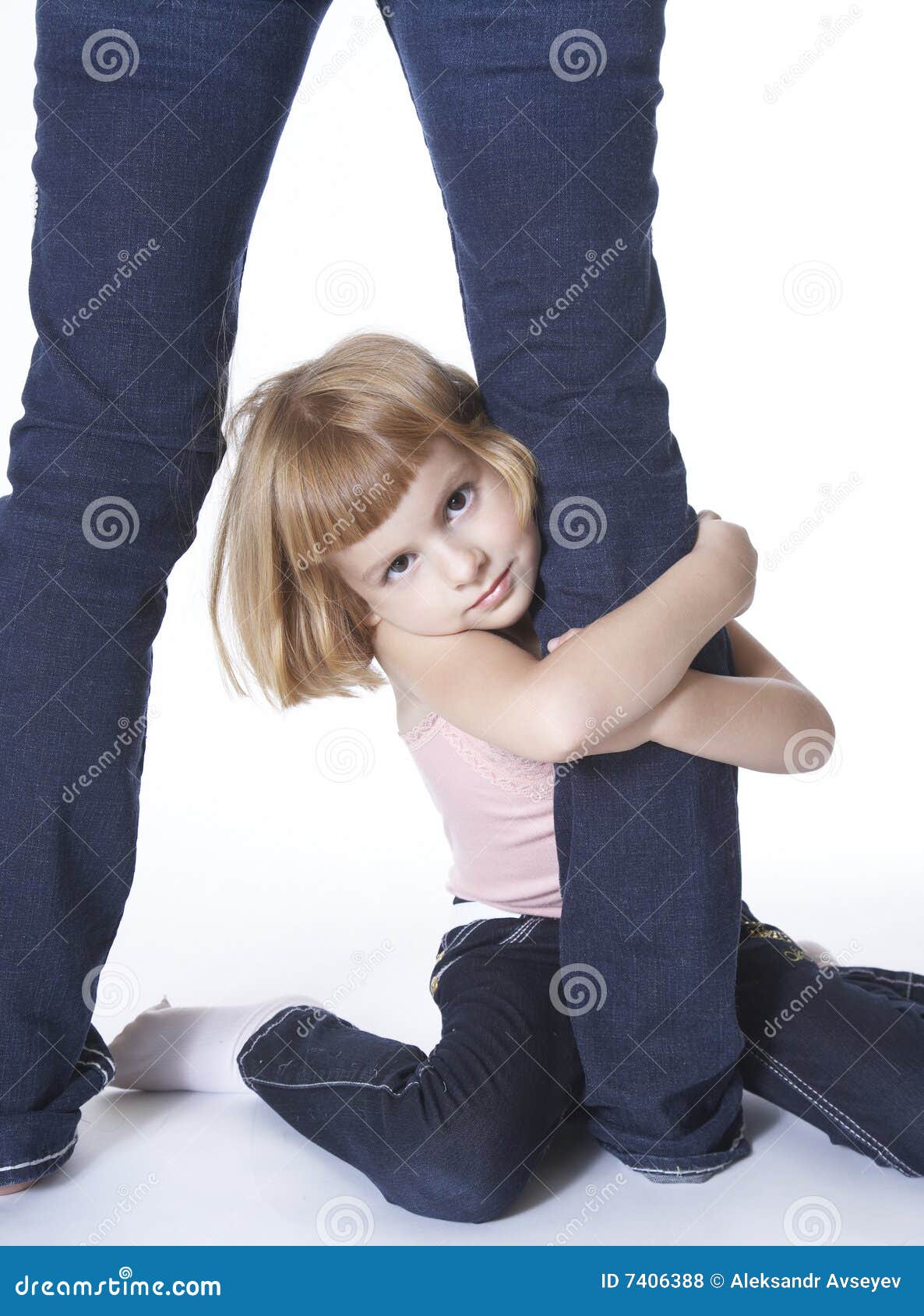 Girl Hugging Mom s Leg stock photo. Image of hair, face - 7406388
