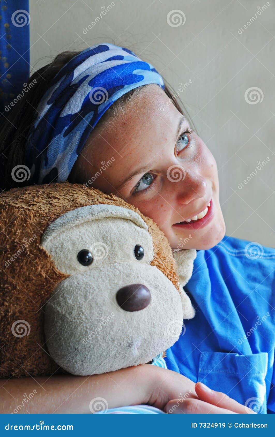 Girl hugging a soft toy stock image. Image of cuddly, cute - 7324919