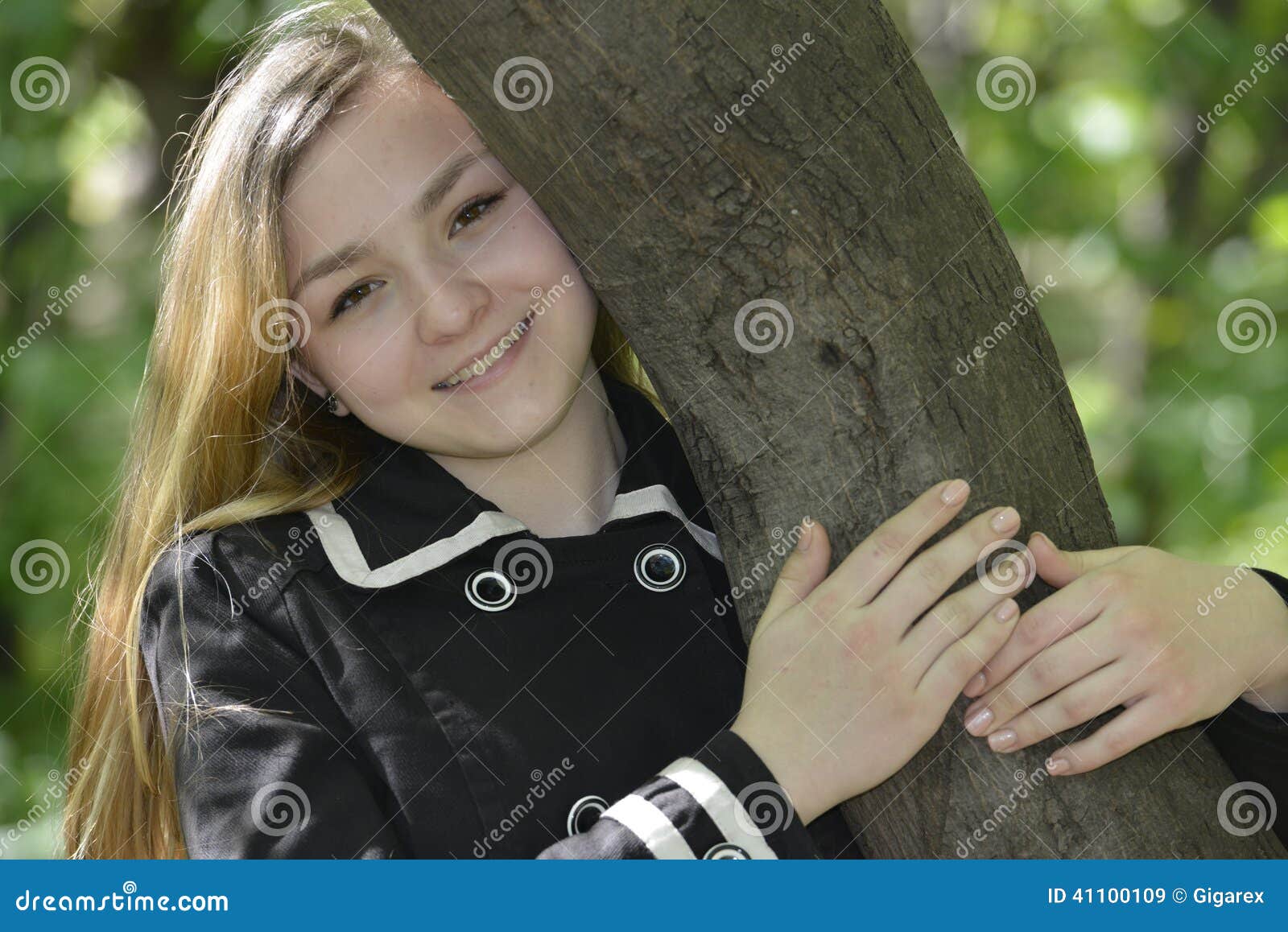 Girl hugging a tree stock image. Image of girl, hair - 41100109