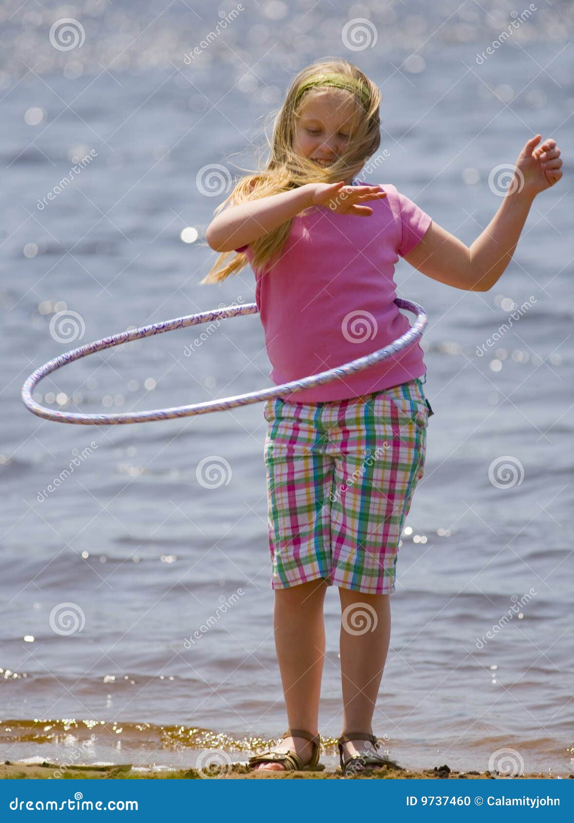 Girl with Hula Hoop on Beach Stock Photo - Image of play, beach: 9737460