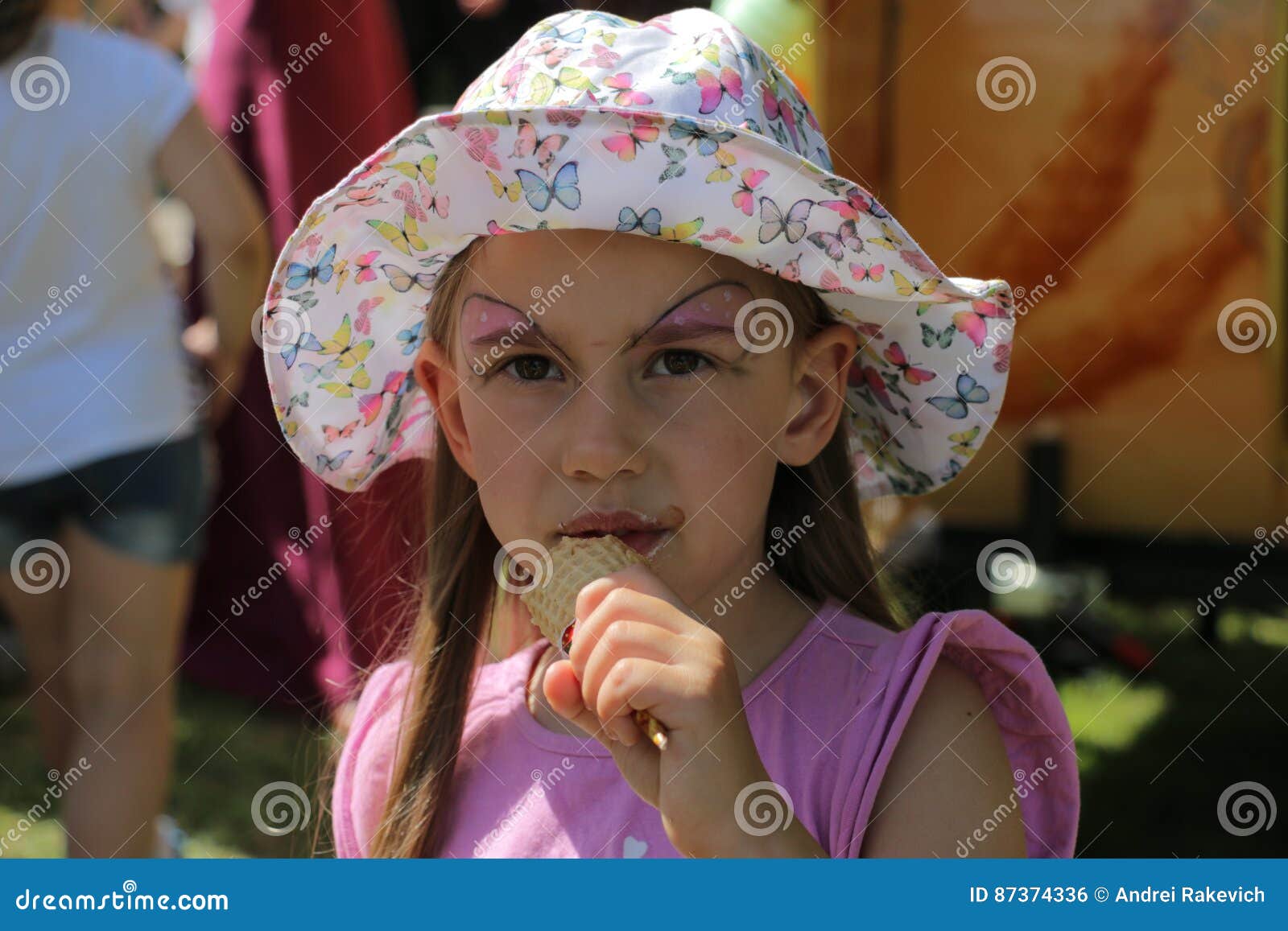 Girl with Ice Cream on the Walk. Stock Photo - Image of portrait, girl ...