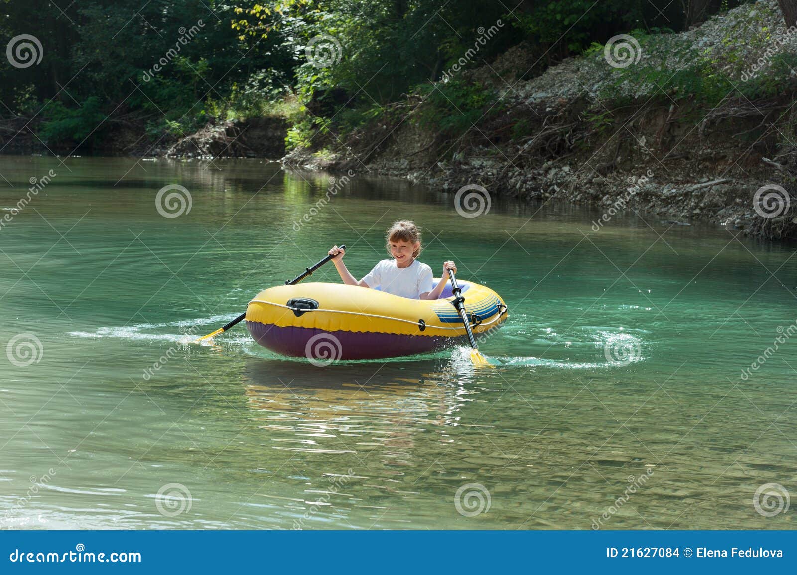 Girl in inflatable boat stock photo. Image of river, green - 21627084