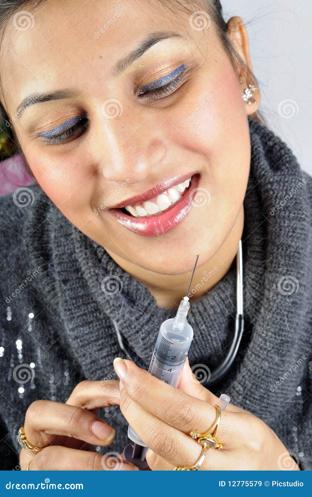 Girl with injection stock image. Image of clothes, rings - 12775579