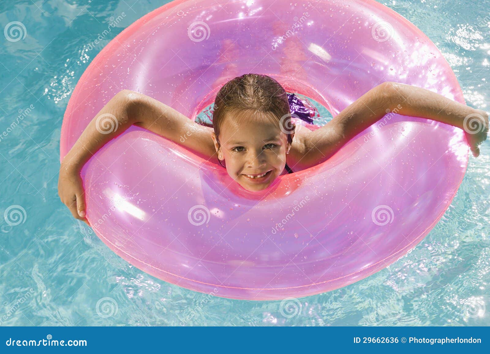 Girl Inside Pink Float Tube in Pool Stock Photo - Image of recreation ...