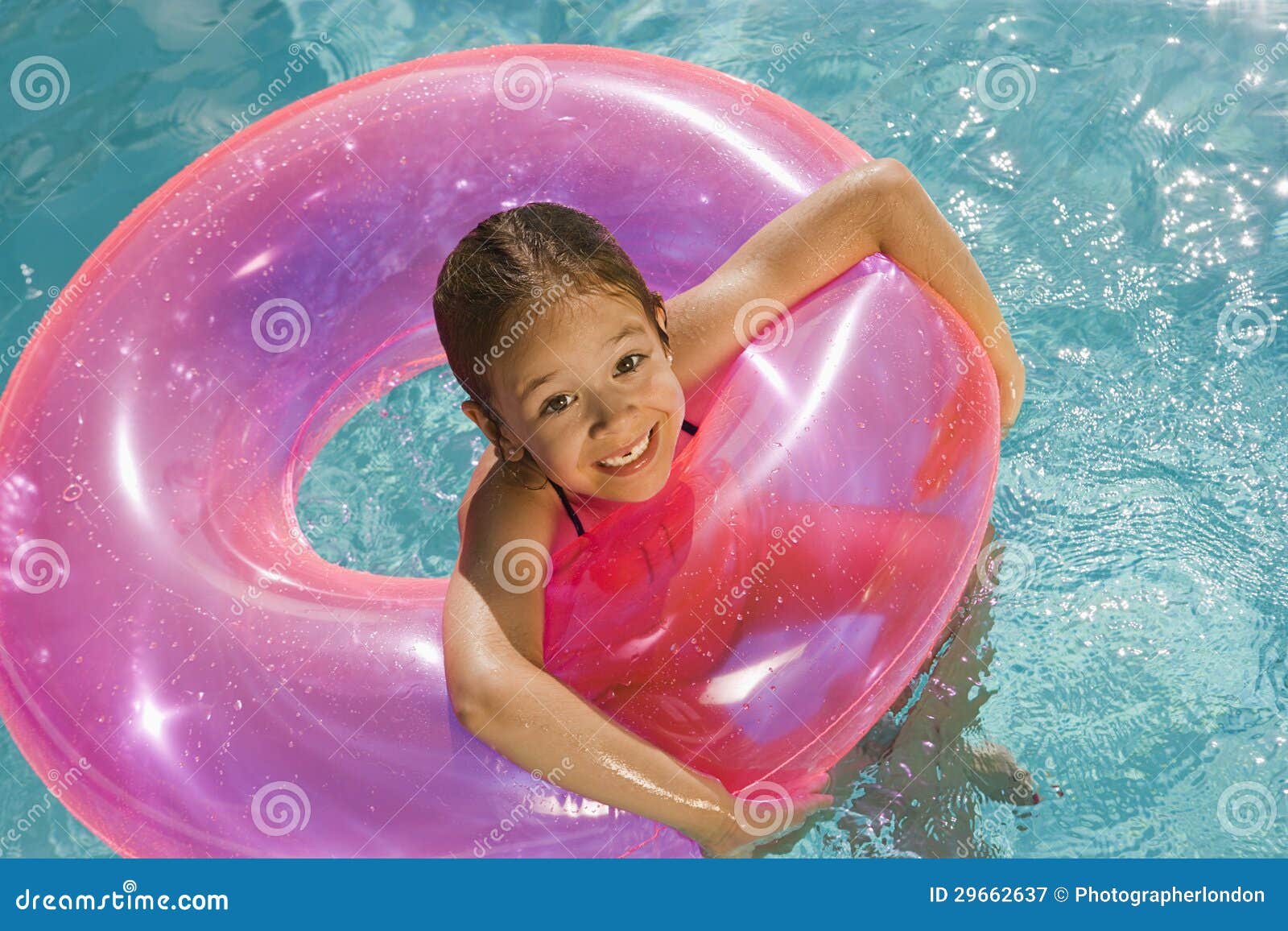Girl Inside Pink Float Tube in Pool Stock Image - Image of holding ...